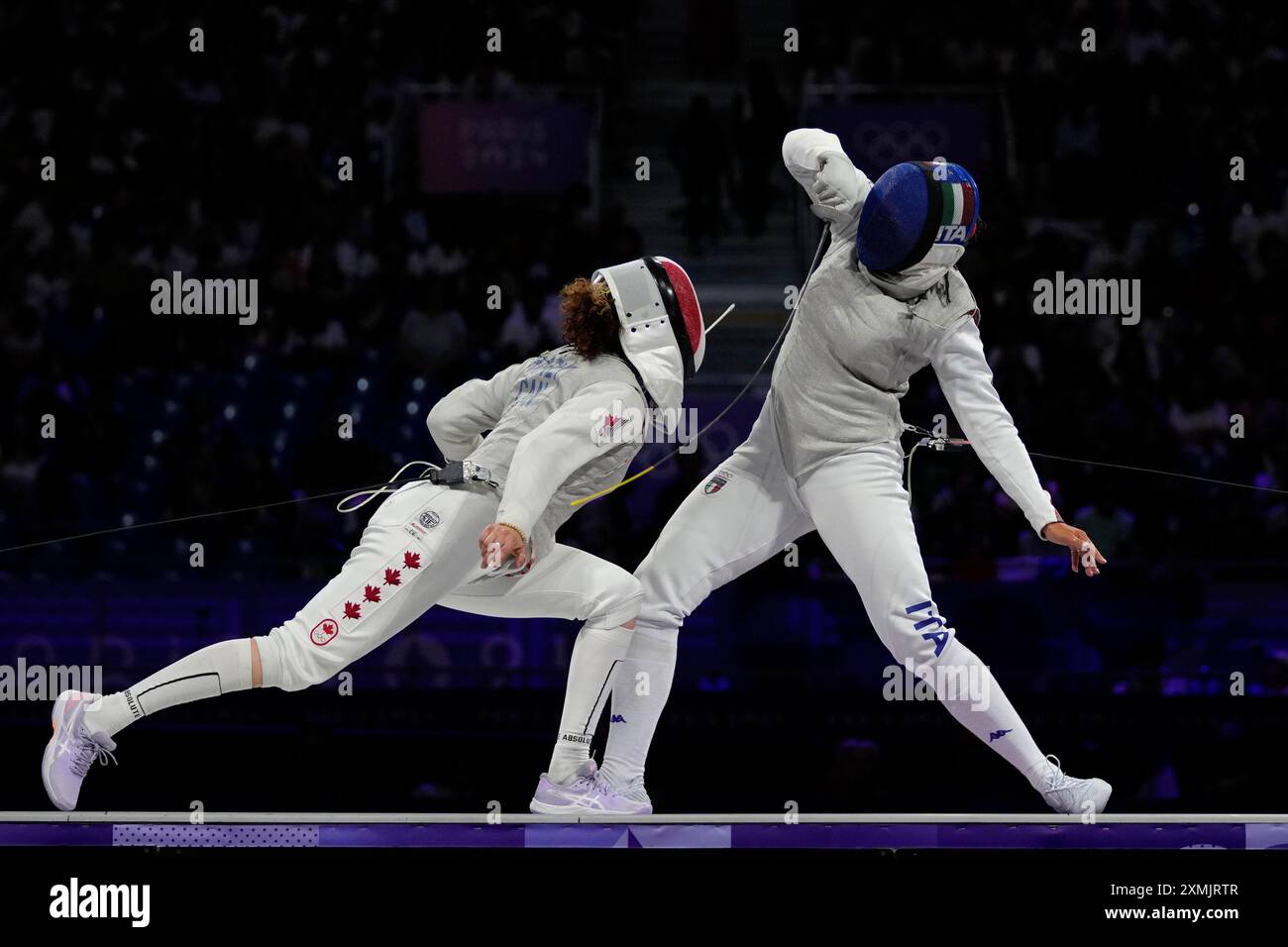 Canada's Eleanor Harvey, left, competes with Italy's Alice Volpi in the ...