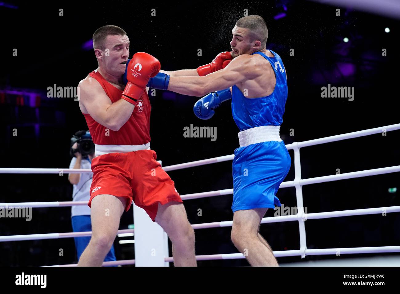 Ireland's Jack Marley, left, fights Poland's Mateusz Bereznicki, right ...