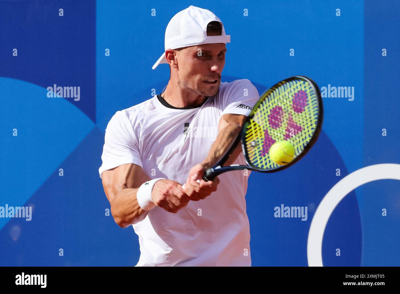 Paris, France, 28 July, 2024. Marton Fucsovics of Hungary hits the ball ...