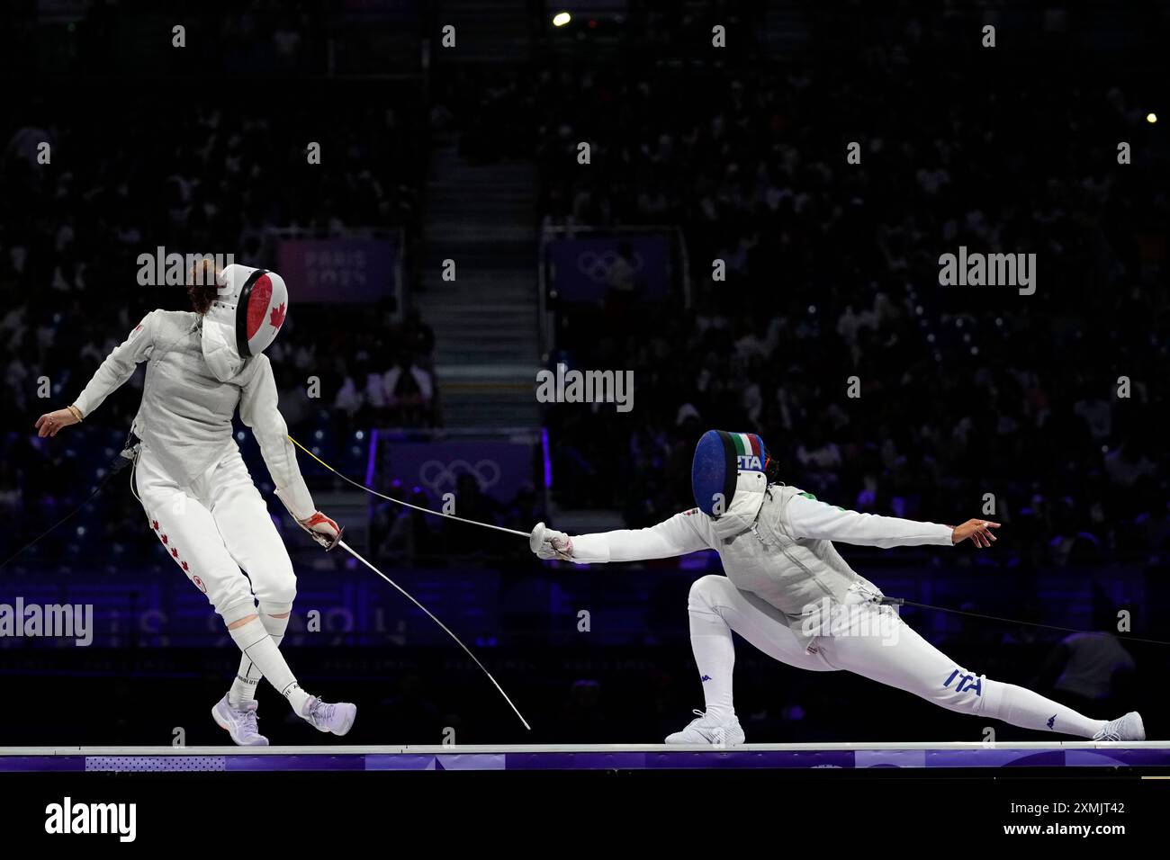 Canada's Eleanor Harvey, left, competes with Italy's Alice Volpi in the ...