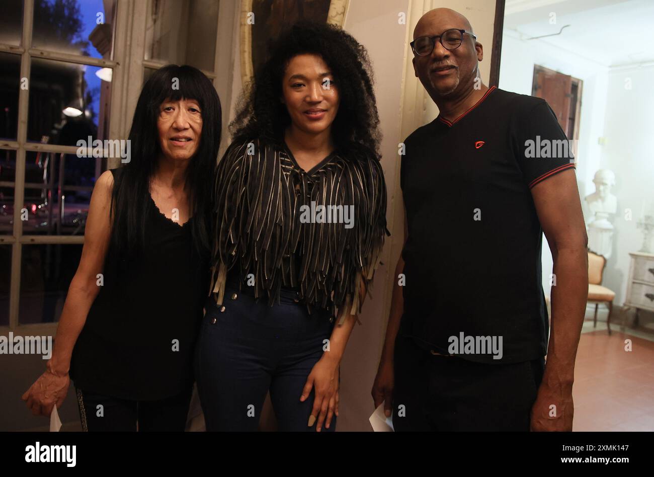 American guitarist and singer Judith Hill poses with her mother Michiko ...