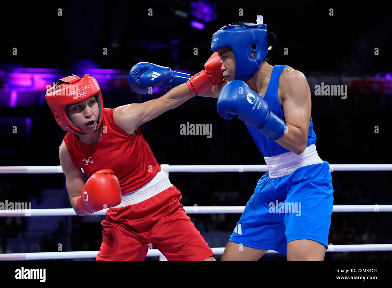 Morocco's Yasmine Mouttaki, left, fights Philippines' Aira Villegas ...