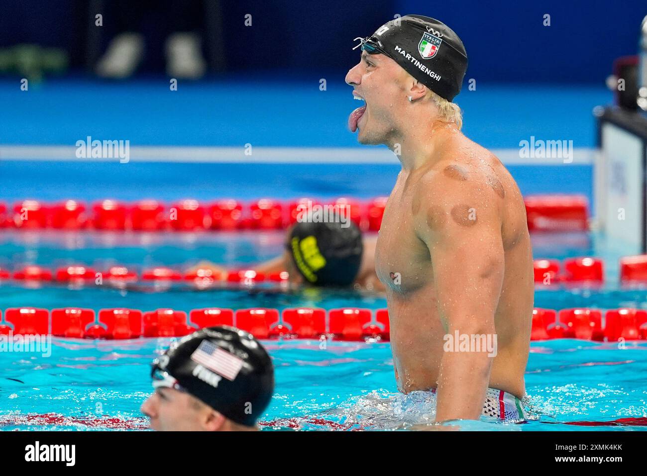 Nicolo Martinenghi, of Italy, celebrates after winning the men's 100 ...