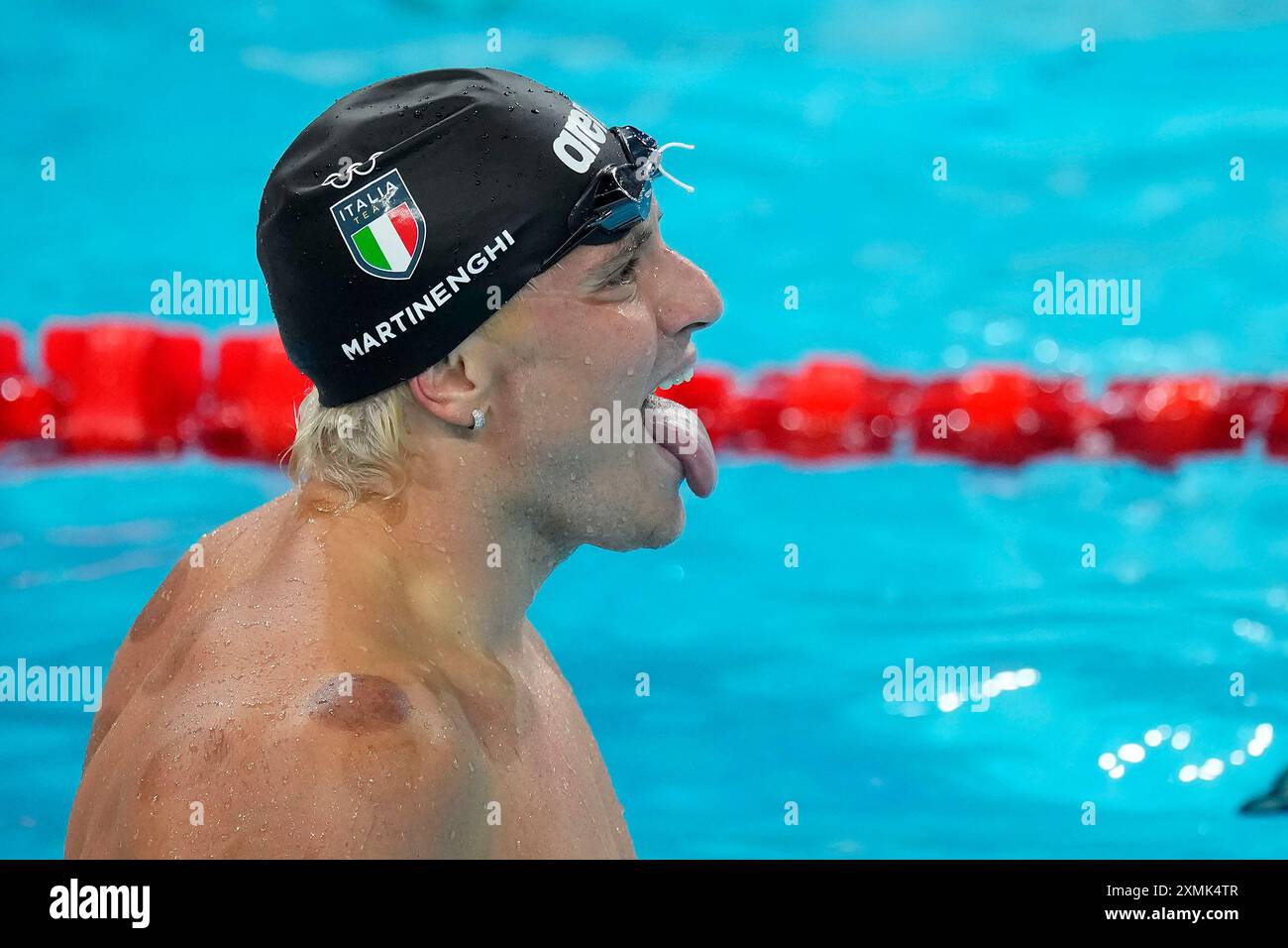Nicolo Martinenghi, of Italy, celebrates after winning the men's 100 ...