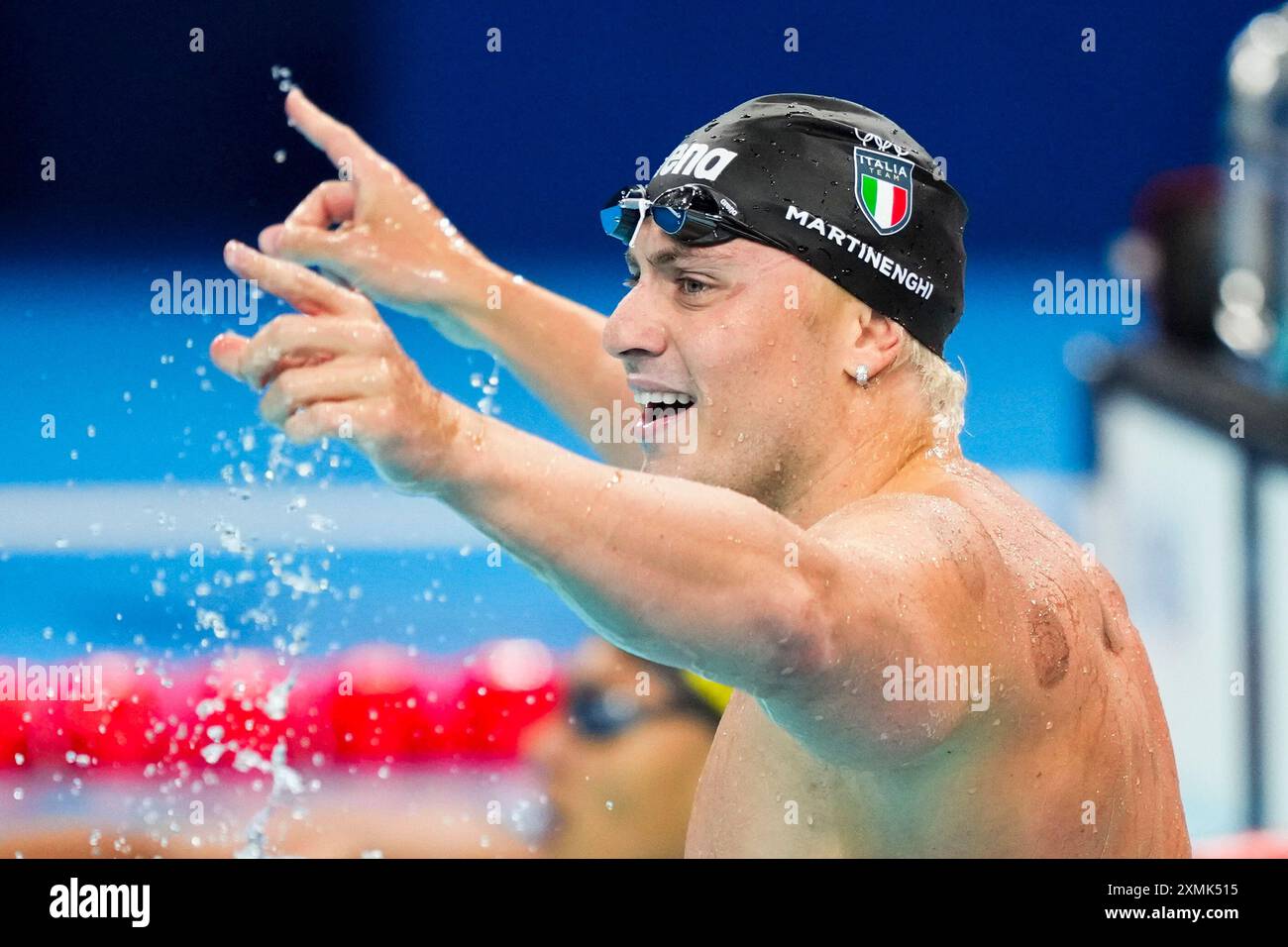 Nicolo Martinenghi, of Italy, celebrates after winning the men's 100 ...