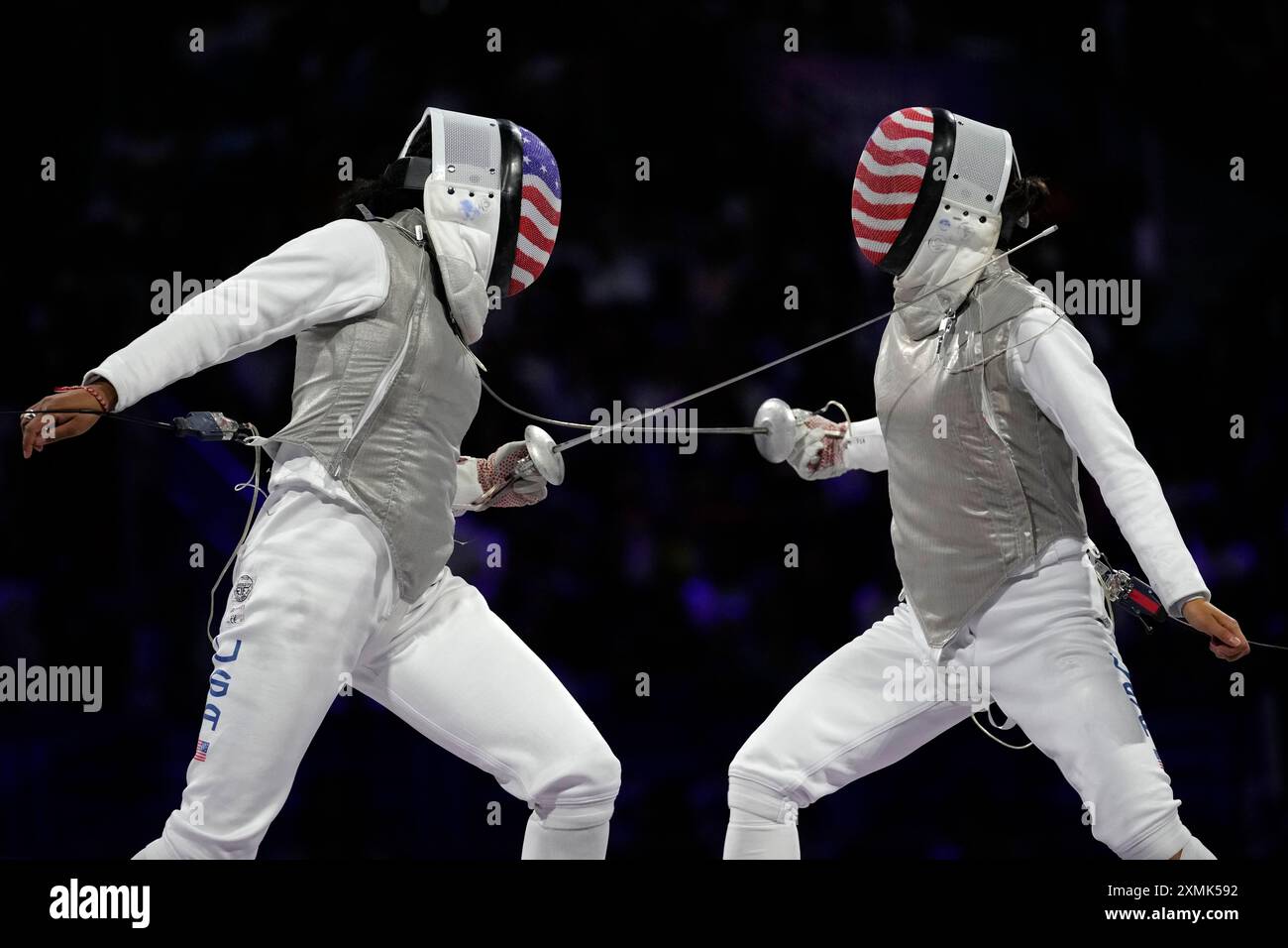 United States' Lee Kiefer, right, competes with United States' Lauren ...