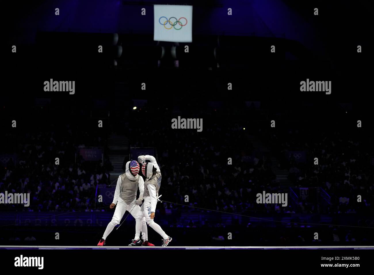 United States' Lee Kiefer, right, competes with United States' Lauren ...
