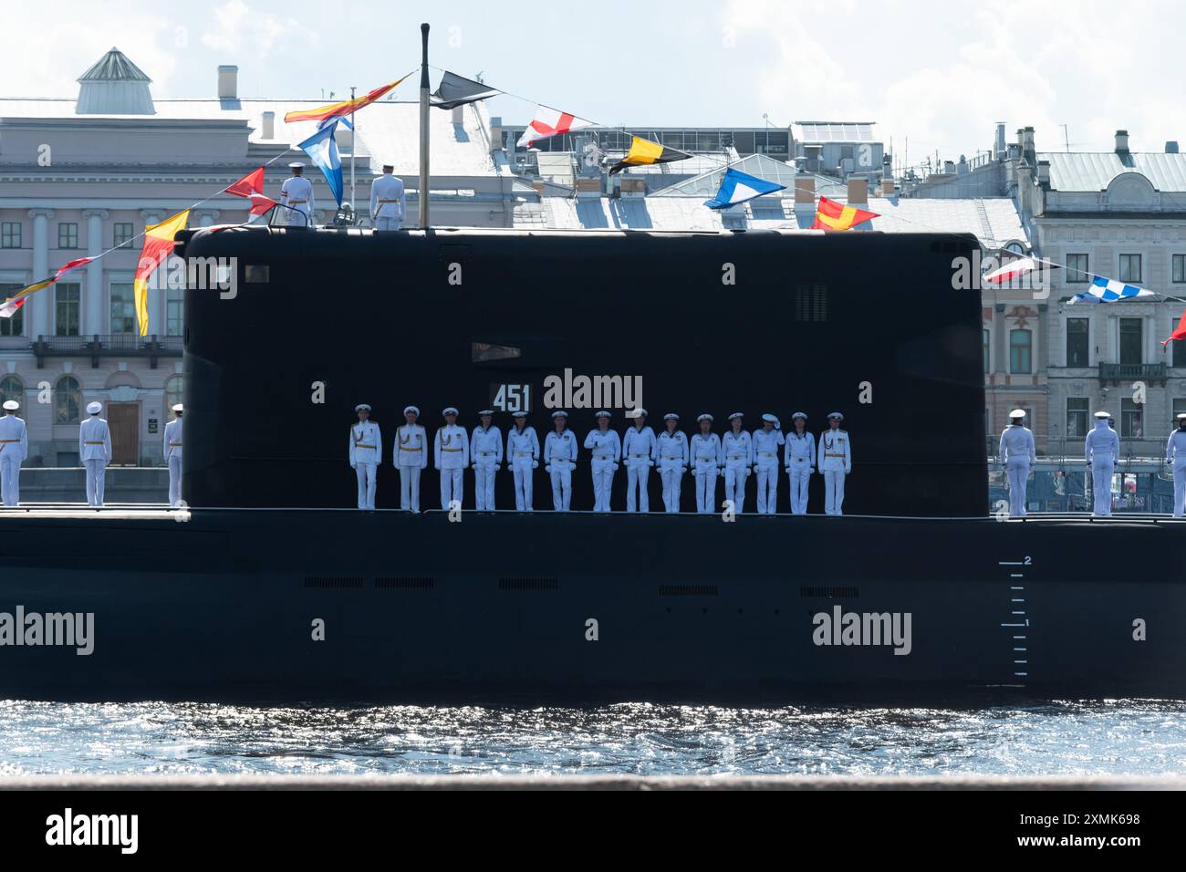 St. Petersburg, Russia. 28th July, 2024. Sailors stand on a submarine ...