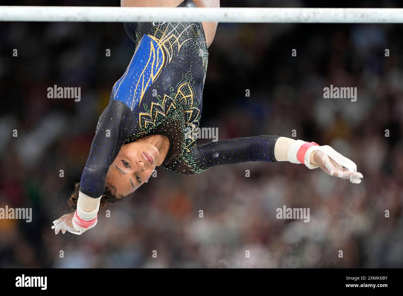 Lorrane Oliveira Of Brazil Competes On The Uneven Bars During A Women