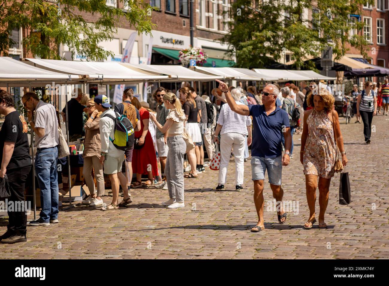 Annual local book market on a sunny day in tower town in historic city ...