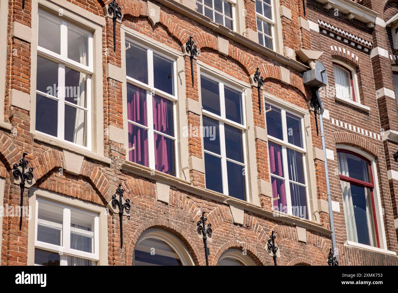 Bright frontal textured typical historic medieval exterior facades of ...