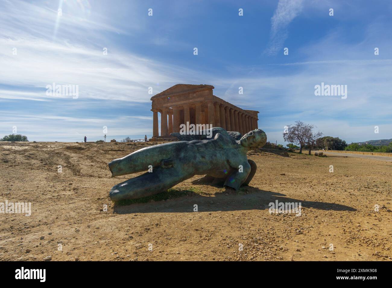 Bronze statue of fallen Icarus in front of Temple of Concordia in the ...