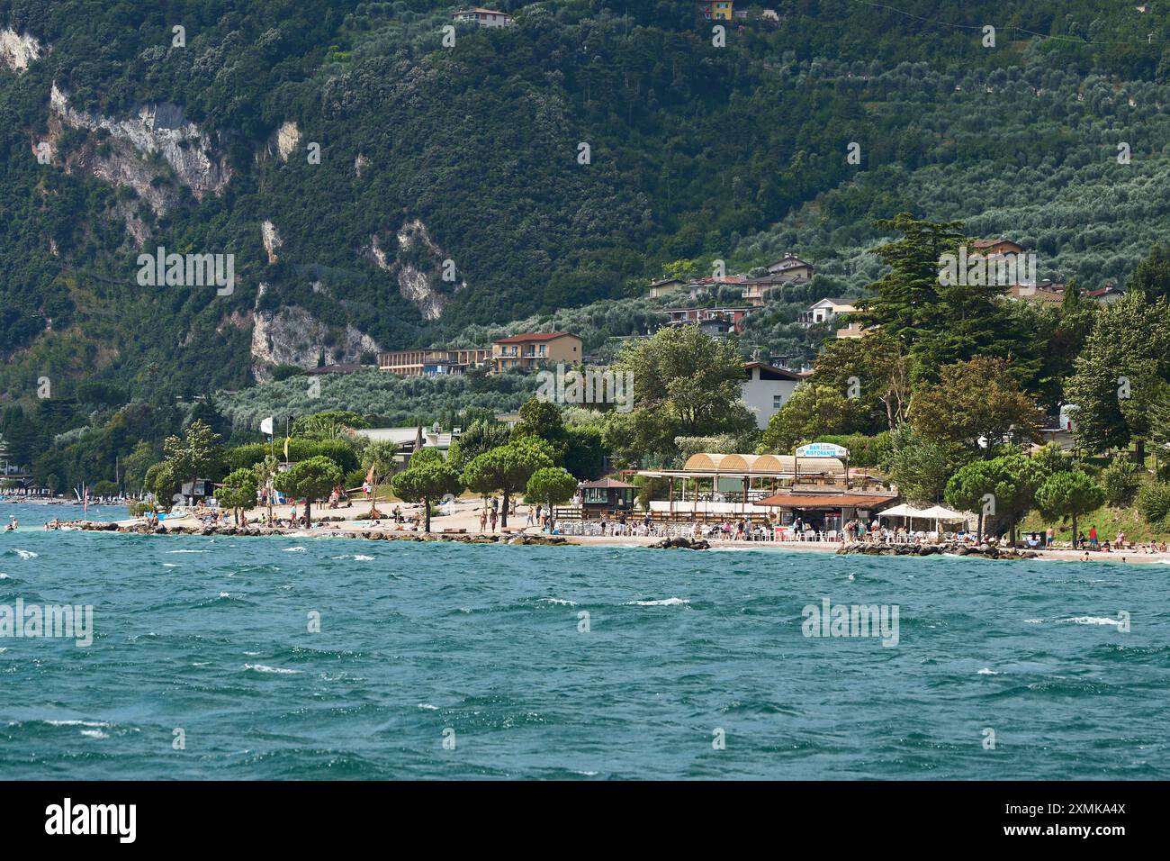 Limone Sul Garda, Lake Garda, Italy - 20 July 2024: The beach at Limone ...
