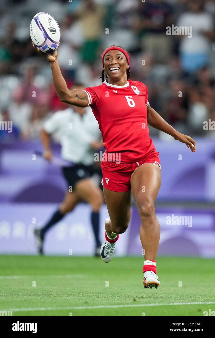 Canada back Charity Williams (6) reacts as she scores a try against New ...