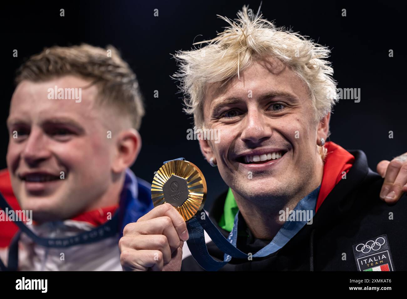 Nicolo Martinenghi of, Italy. , . celebrates with his gold medal after ...