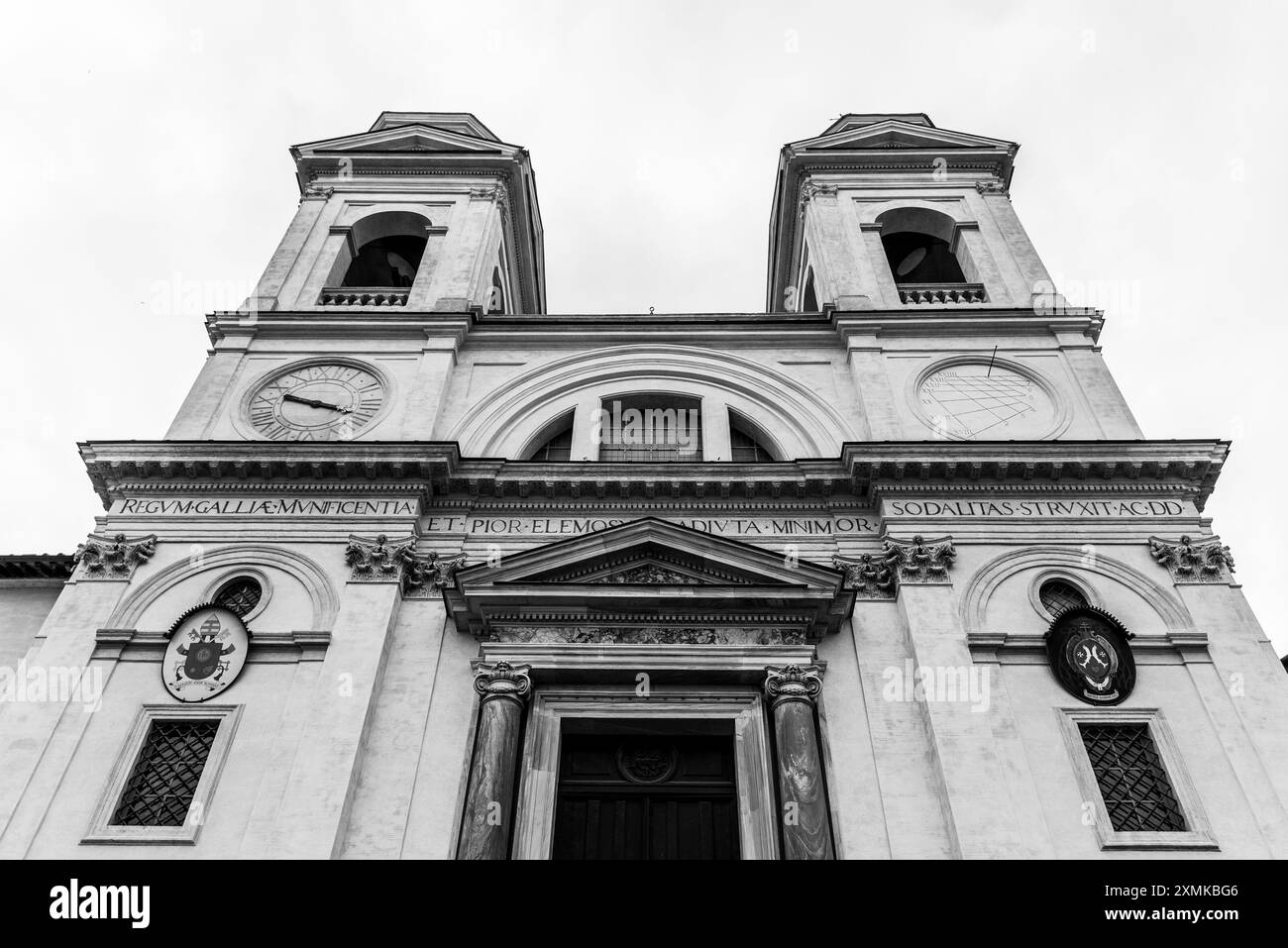 The stark architecture of the Trinita dei Monti church stands out ...