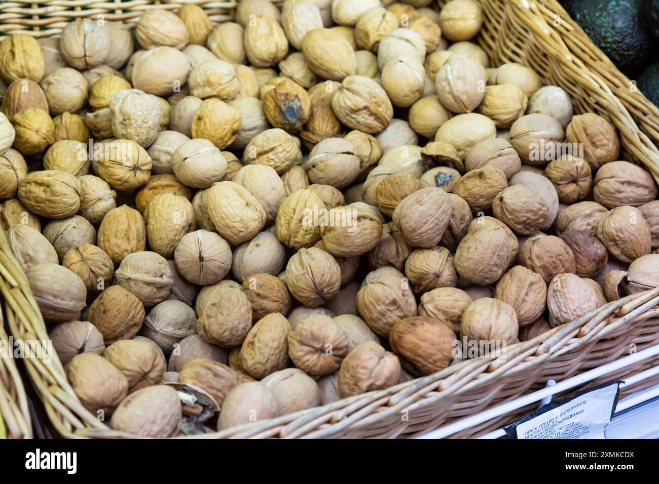 Many walnuts. Nuts in a box. Texture nuts Stock Photo - Alamy