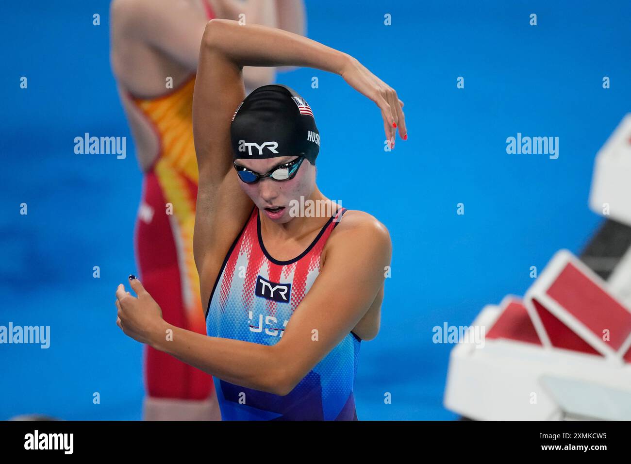 Torri Huske, of the United States, stretches ahead of the women's 100 ...