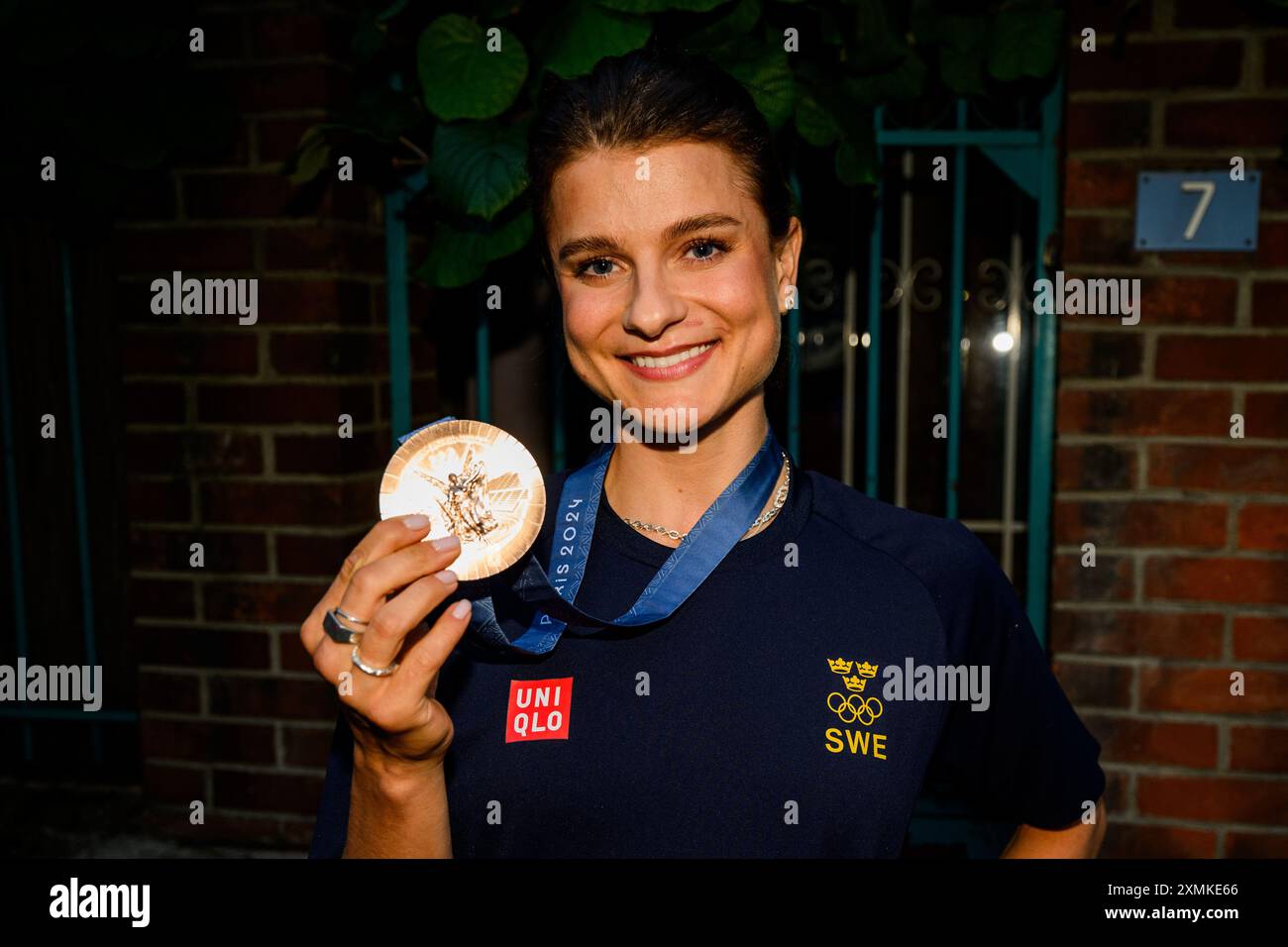 Jenny Rissveds of, Sweden. , . poses for a portrait with the Swedish flag after winning a bronze ...