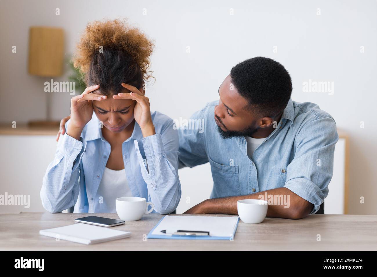 African American Husband Comforting Desperate Wife Crying On Family ...