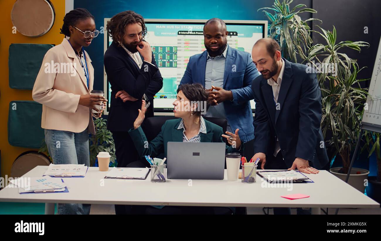 Angry manager screaming diverse employees hi-res stock photography and ...