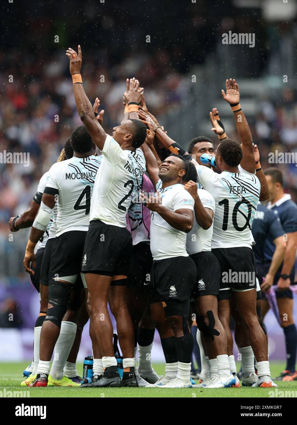 PARIS, FRANCE - JULY 27: Team Fiji celebrate after their sides victory ...