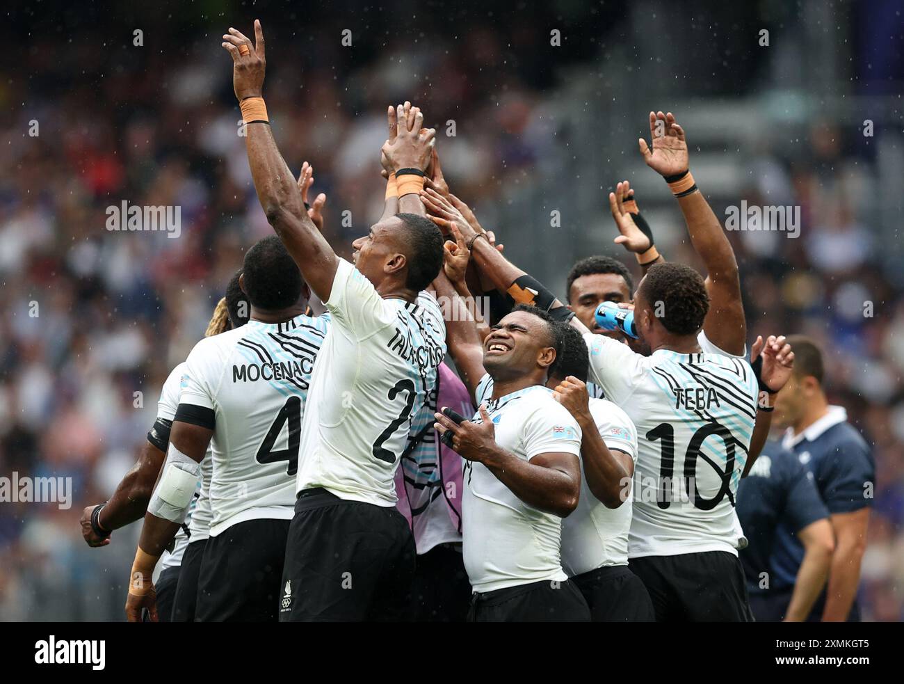 PARIS, FRANCE - JULY 27: Team Fiji celebrate after their sides victory ...