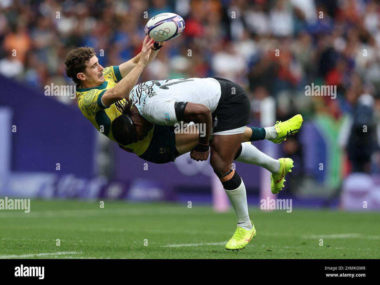 PARIS, FRANCE - JULY 27: Kaminieli Rasaku of Team Fiji tackles Ben ...