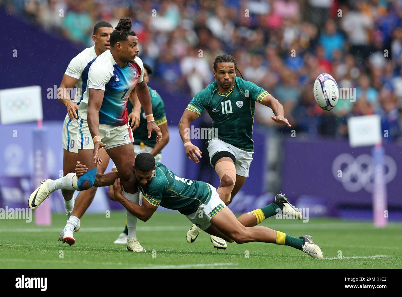 PARIS, FRANCE - JULY 27: Shilton van Wyk of Team South Akfrica tackles ...