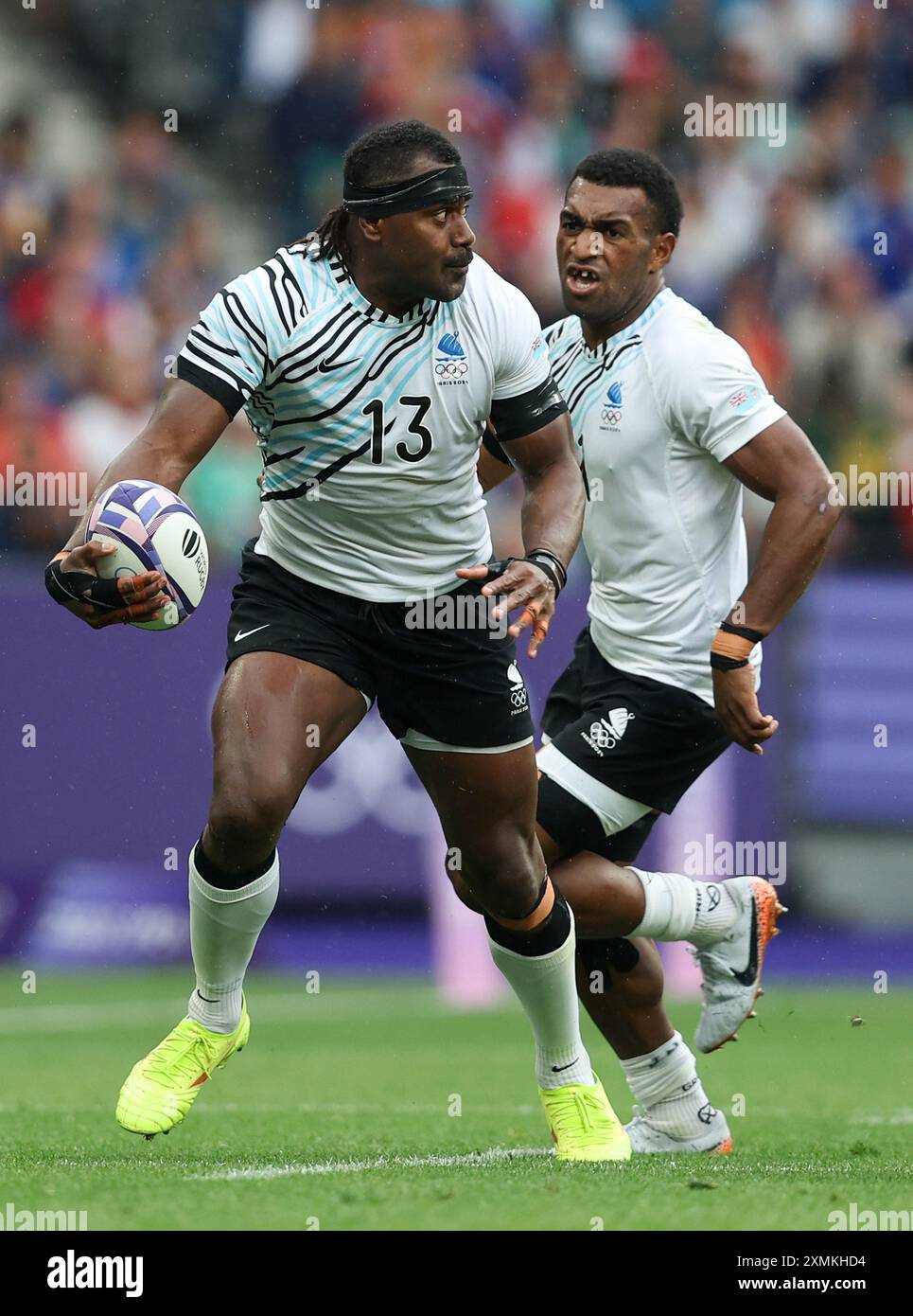 PARIS, FRANCE - JULY 27: Raisuqe Josaia of Team Fiji runs with a ball ...