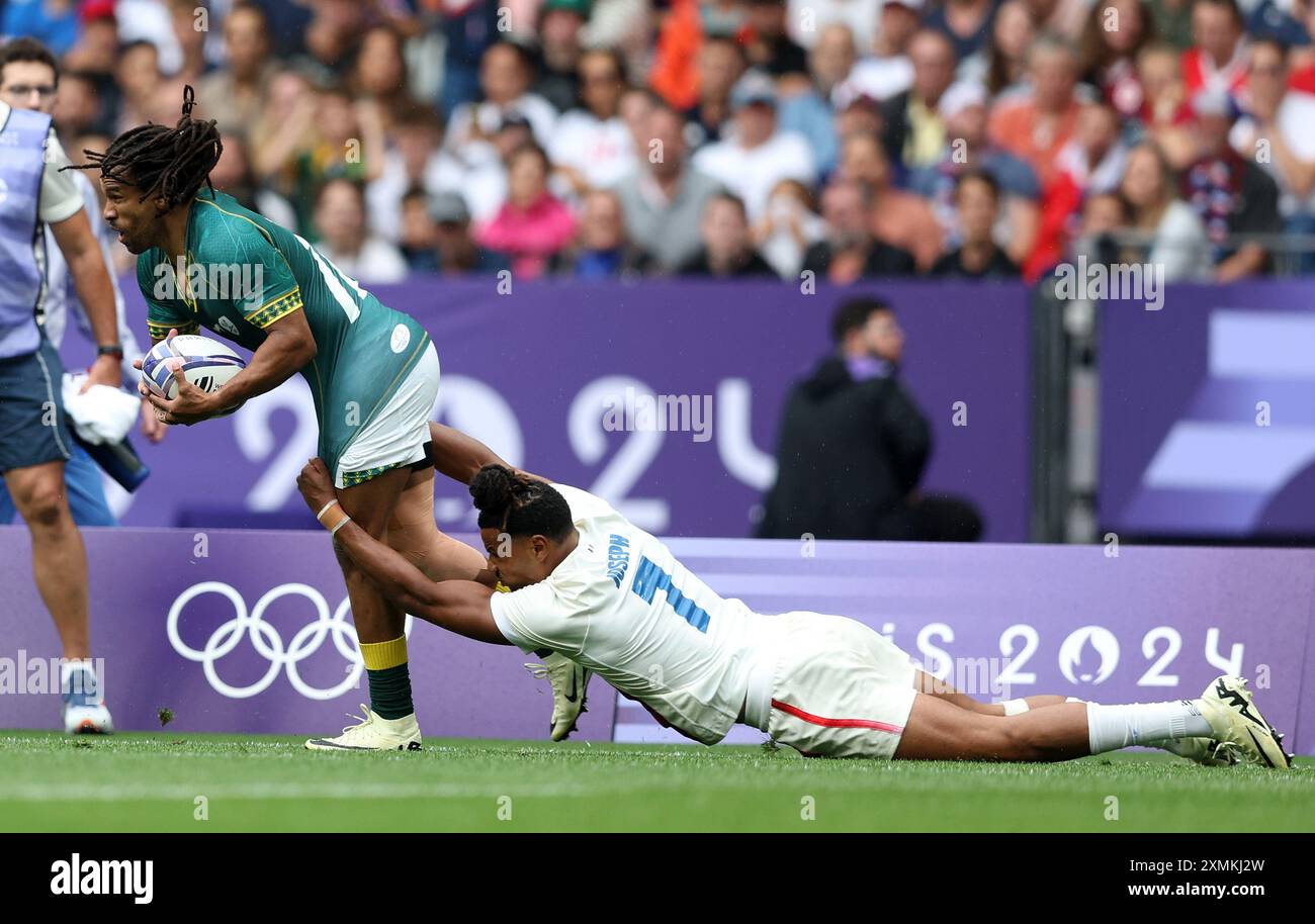 PARIS, FRANCE - JULY 27: Jefferson Lee Joseph of Team France tackles ...