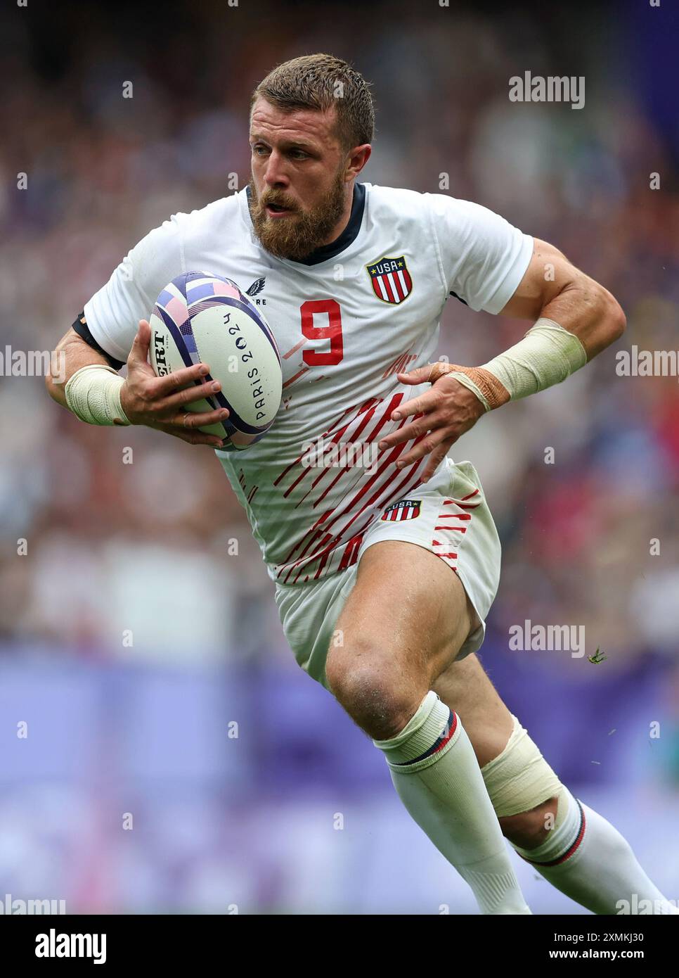 PARIS, FRANCE - JULY 27: Steve Tomasin of Team United States runs with ...