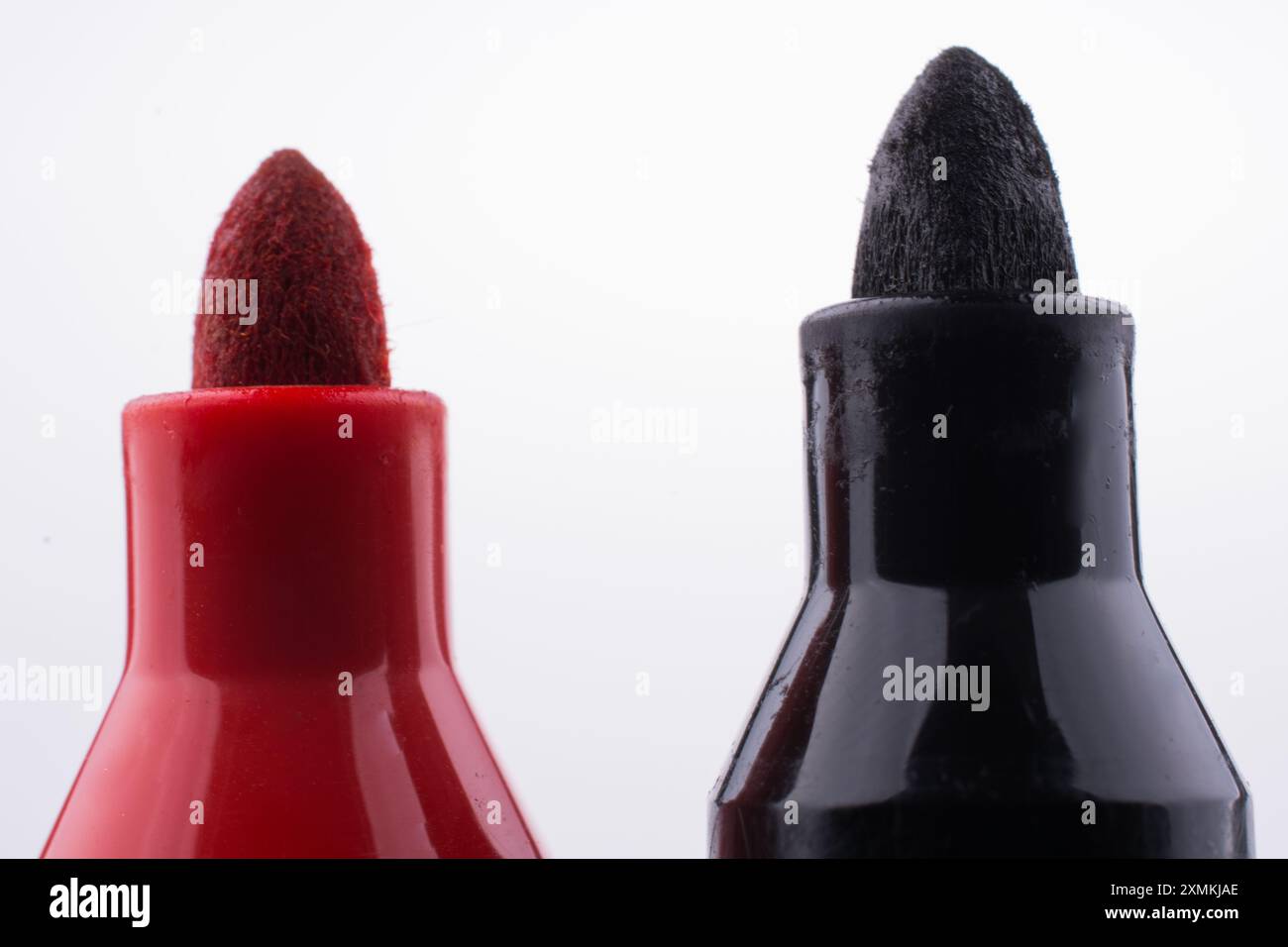 Color markers side by side on a white background Stock Photo - Alamy