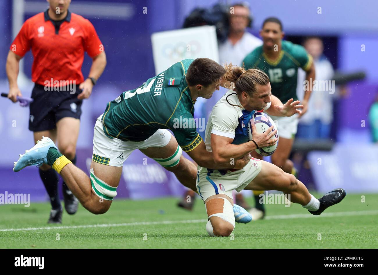 PARIS, FRANCE - JULY 27: Impi Visser of Team South Akfrica tackles ...