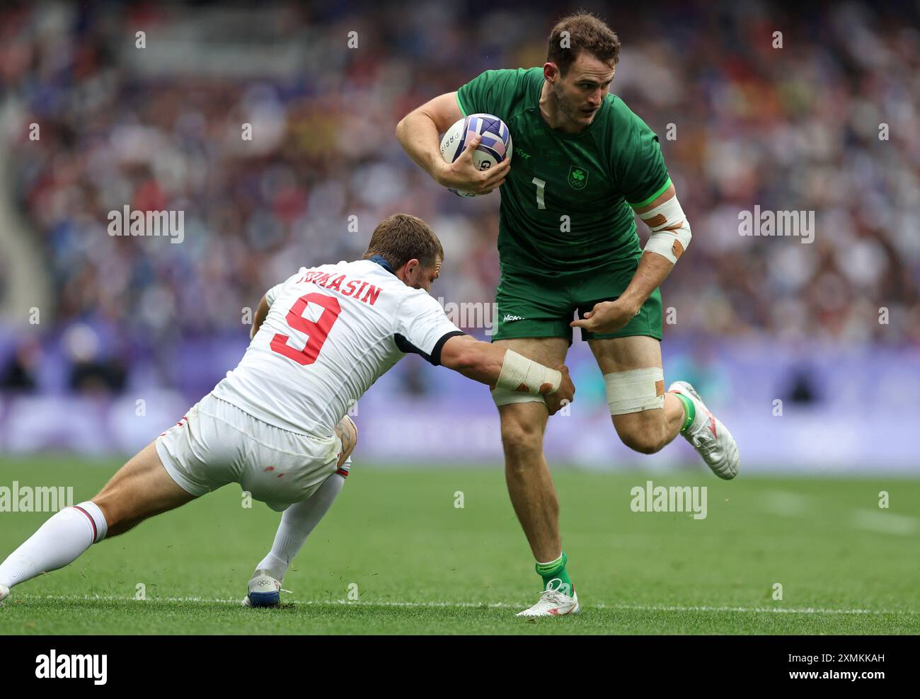 PARIS, FRANCE - JULY 27: Steve Tomasin of Team United States tackles ...