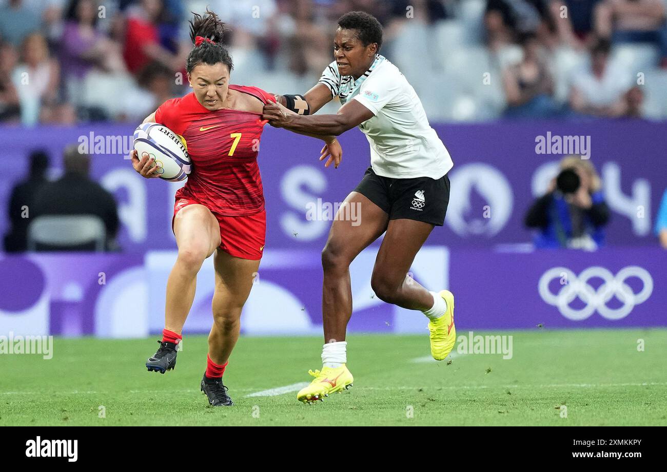 Paris, France. 28th July, 2024. Chen Keyi (L) of China competes with ...