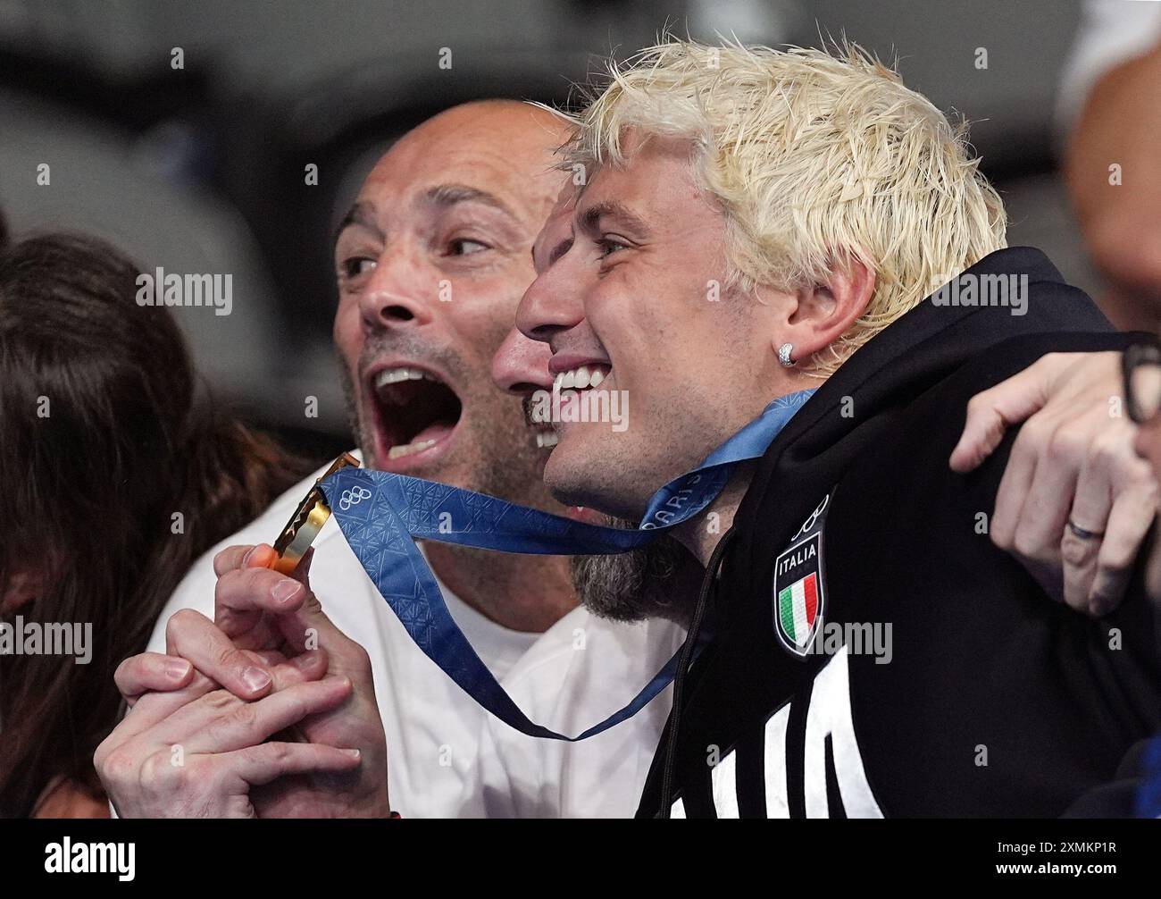 Paris, France. 28th July, 2024. Gold medalist Nicolo Martinenghi (R) of ...