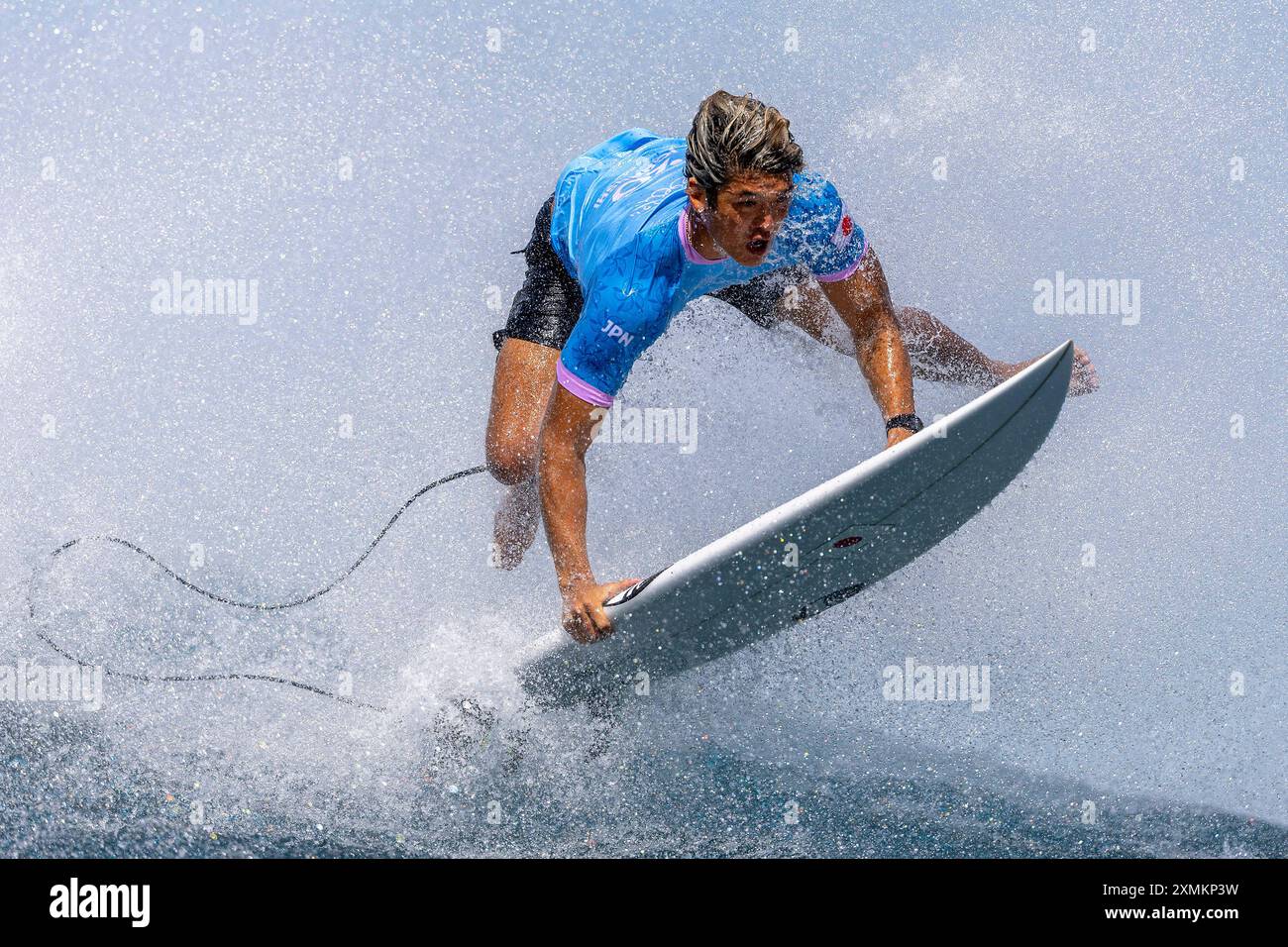 Kanoa Igarashi, of Japan, exits a wave during the second round of the ...