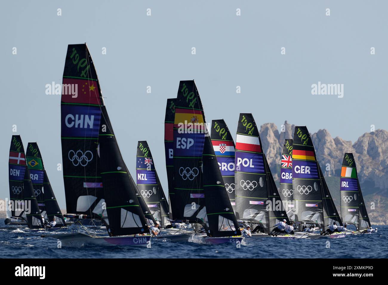 The men's 49er skiff class fleet sails just after the start of a race ...