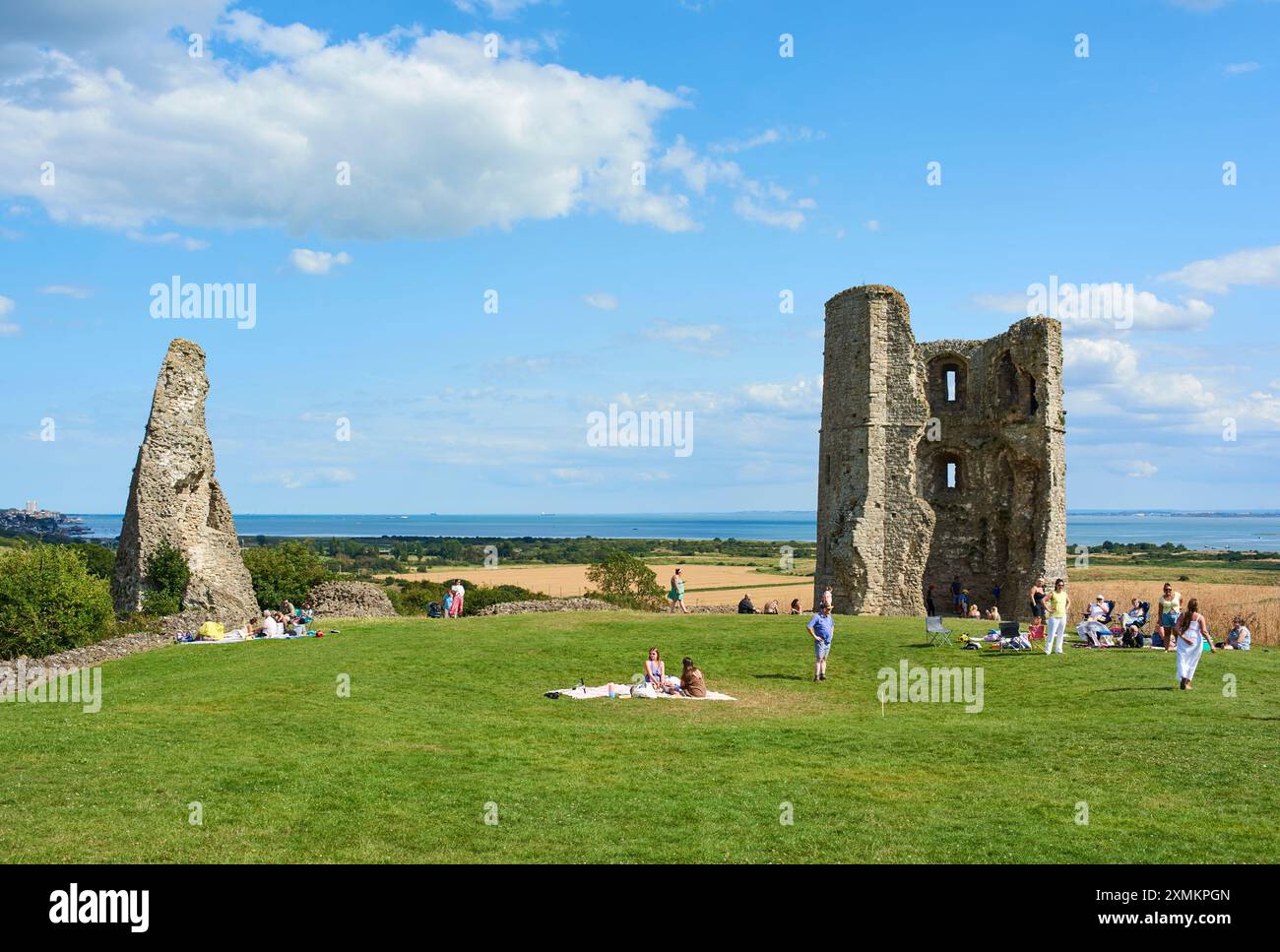The remains of Hadleigh Castle, Essex, UK, in summertime, with visitors ...