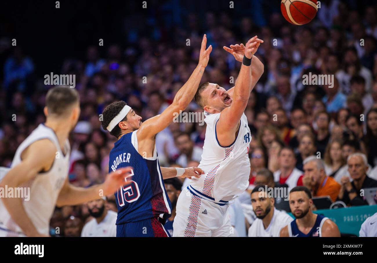 Paris, France. 27th Jul 2024. Nikola Jokic (SRB) Devin Booker (USA ...
