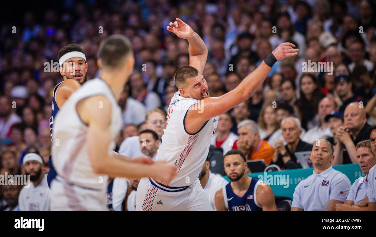 Paris, France. 27th Jul 2024. Nikola Jokic (SRB) Devin Booker (USA ...