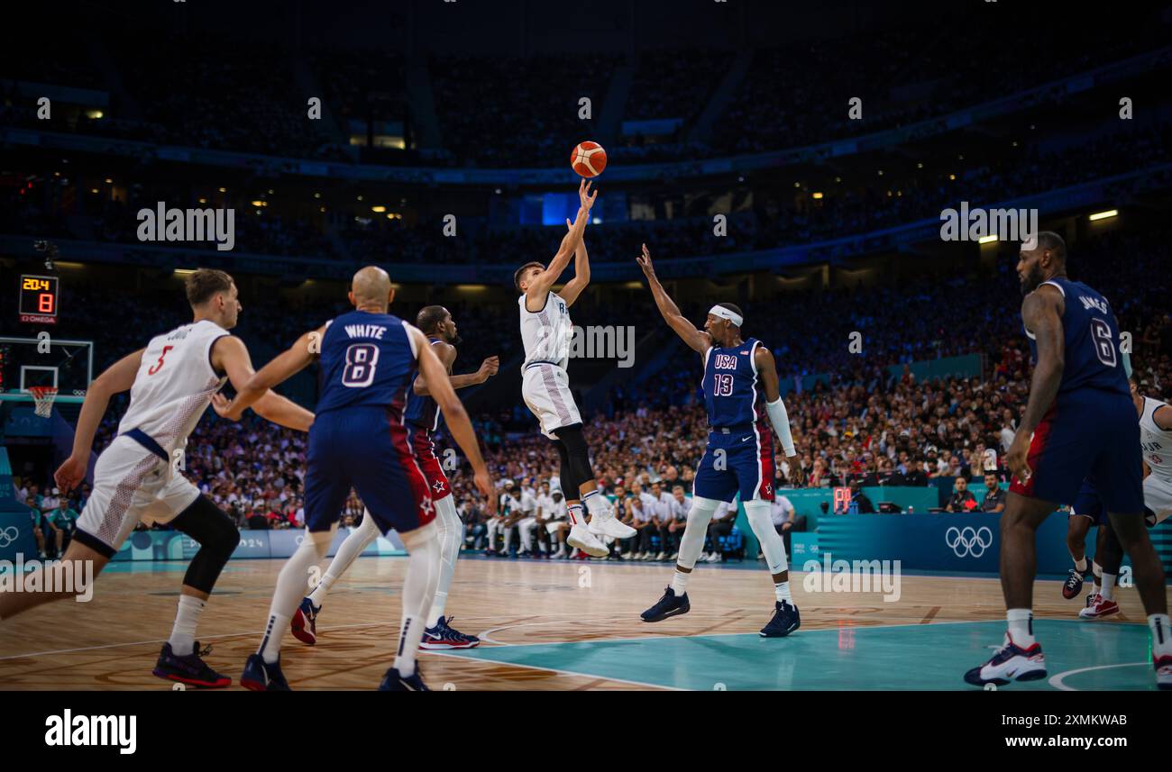 Paris, France. 27th Jul 2024. Bogdan Bogdanovic (SRB) Bam Adebayo (USA ...