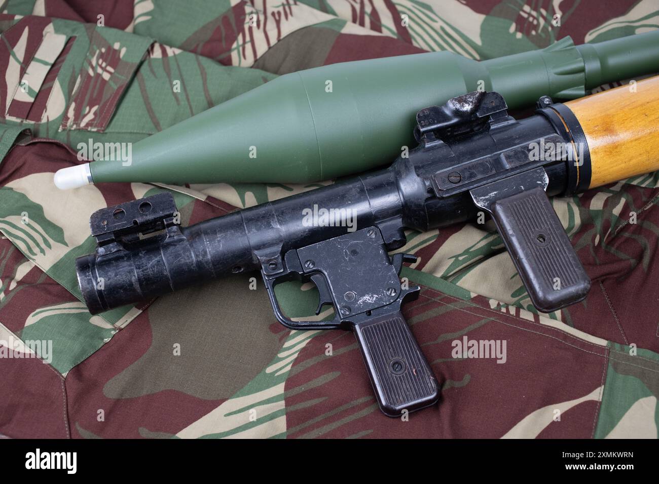 rocket propelled grenade launcher RPG 7 on camo uniform background ...