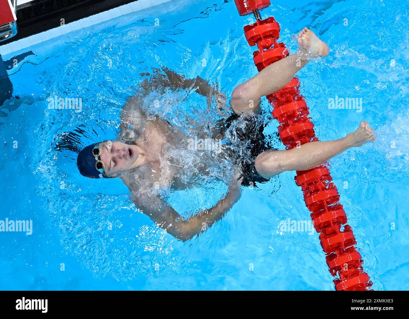 Paris, France. 28th July, 2024. Leon Marchand of France celebrates ...