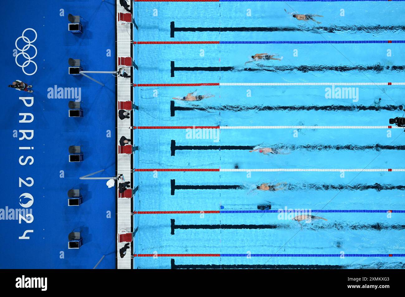 Paris, France. 28th July, 2024. Leon Marchand (3rd from top) of France ...