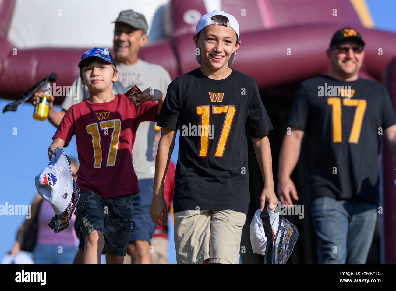 Ashburn, VA, USA. 28th July, 2024. Washington Commanders fans walk to ...