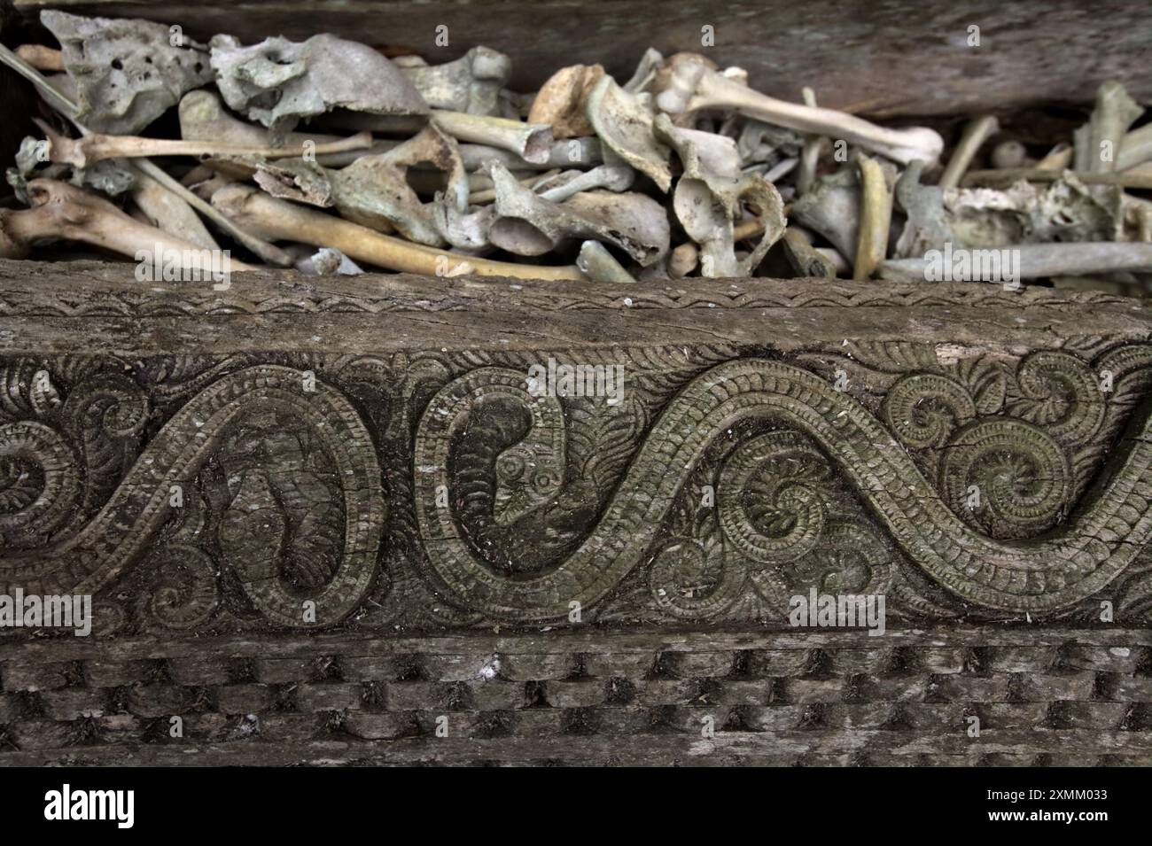 Indigenous decorative carving on wooden sarcophagus at the traditional ...