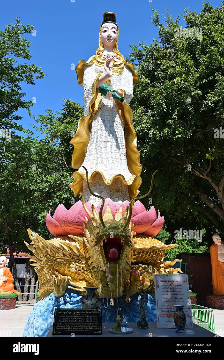 Statue of Guan Yin bodhisattava, the Goddess of Mercy, on a dragon ...