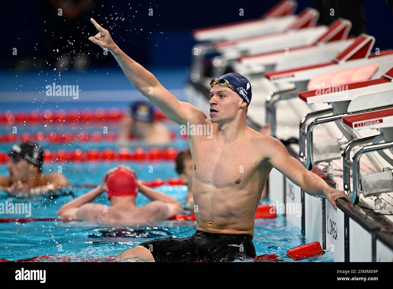 Paris, France. 28th July, 2024. Leon Marchand of France celebrates ...